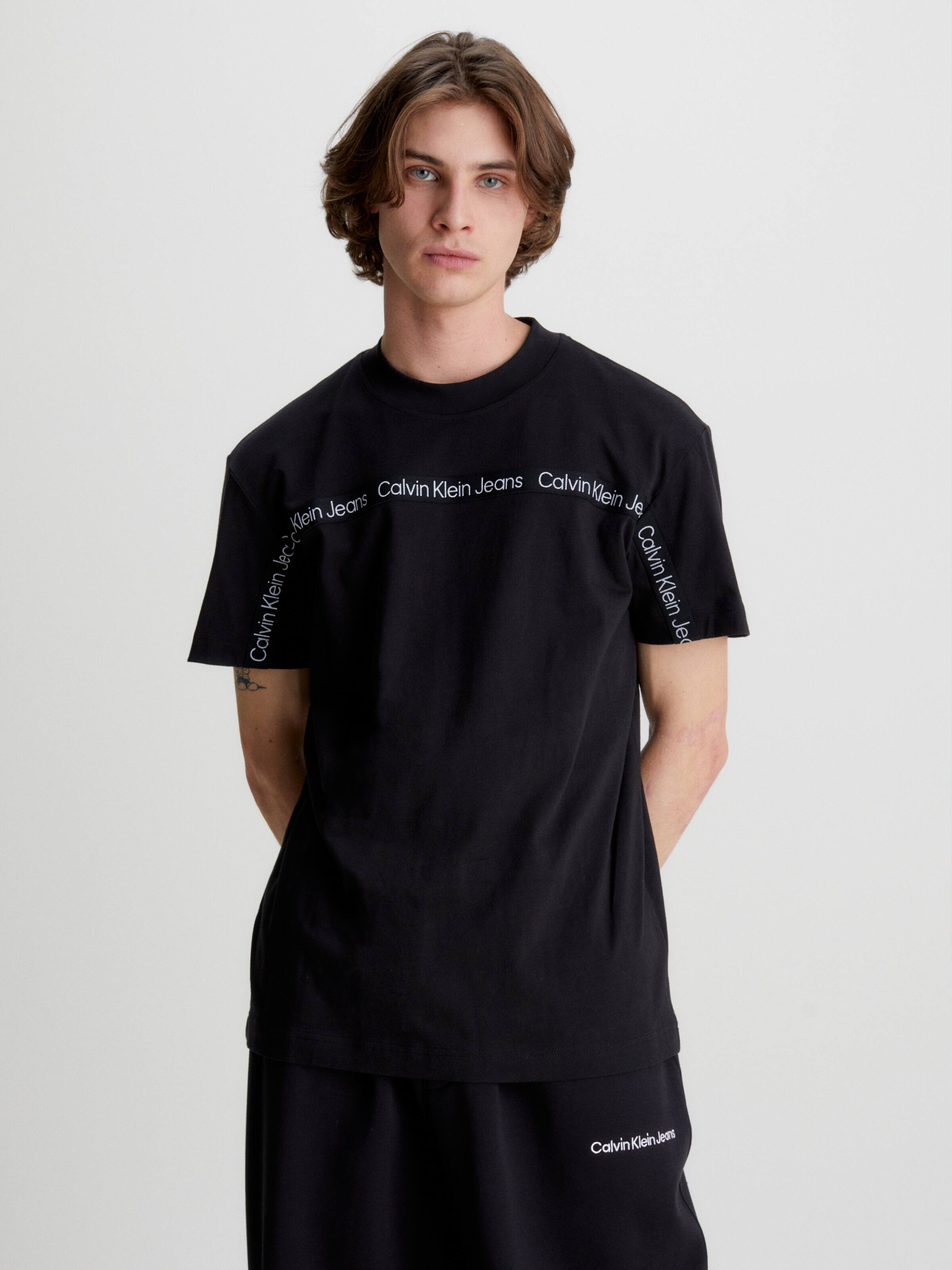 Logo Tape Tee In Black - Just Jeans Online