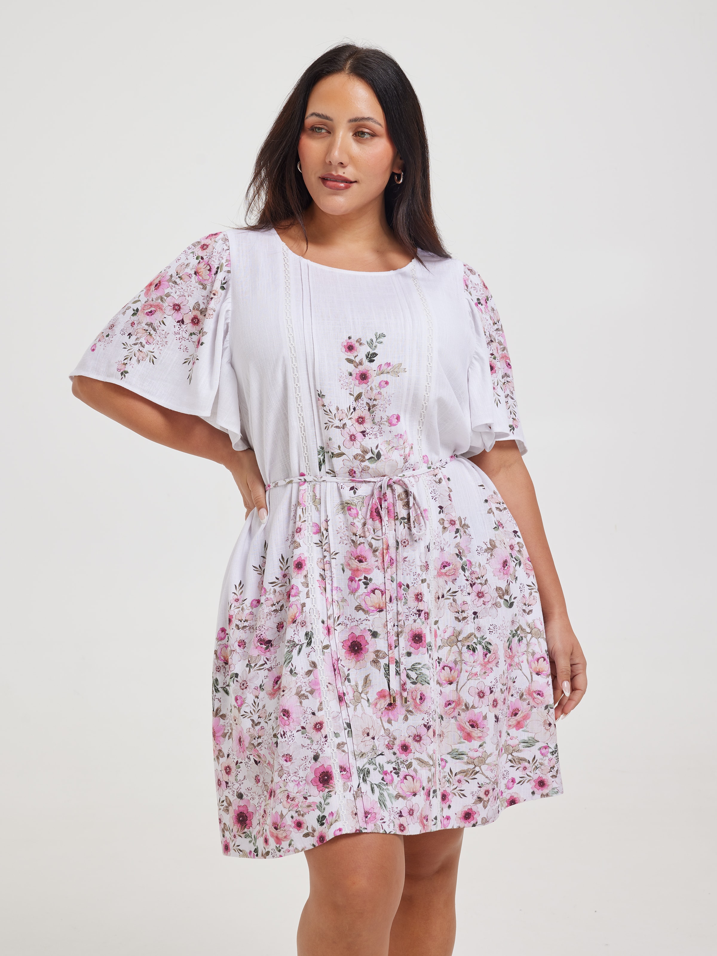 Curve Zara Flutter Sleeve Dress Neutral Floral Placement - Just Jeans ...